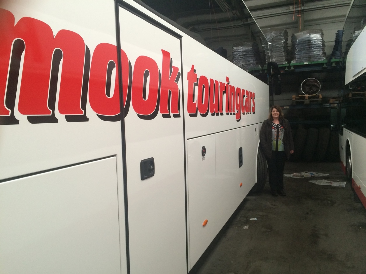 Two large Van Mook coaches with astrid in the back